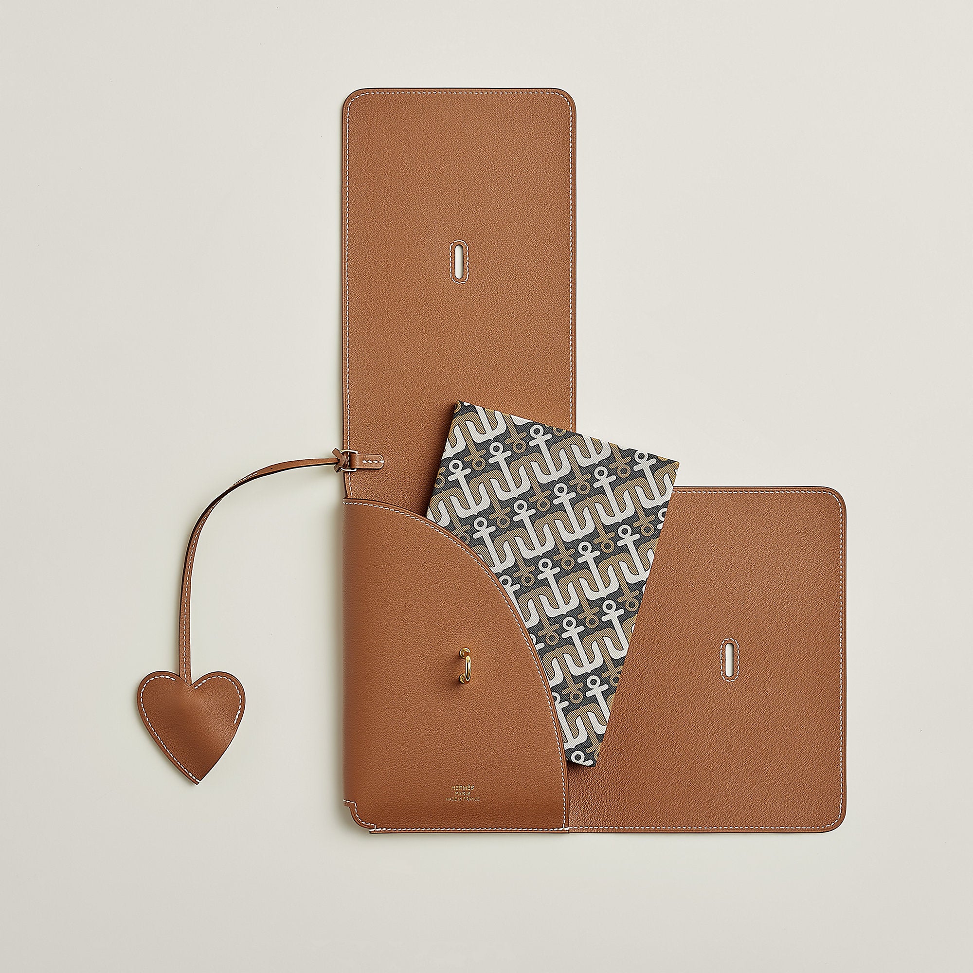 Notebook cover in Swift calfskin and notebook bound in "Ancres" printed ...